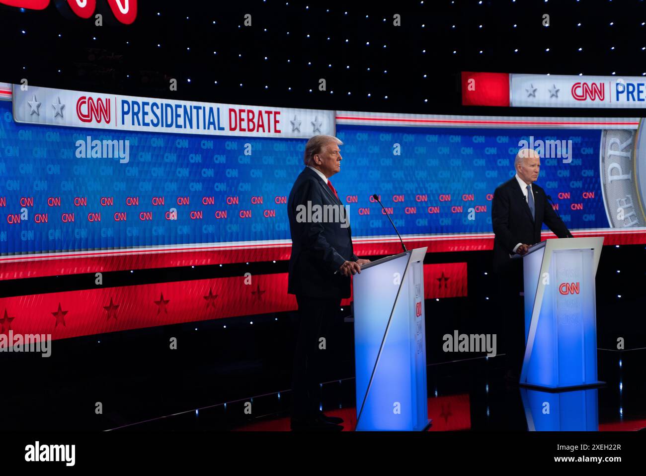 Former President Donald Trump stands on the debate stage during the ...