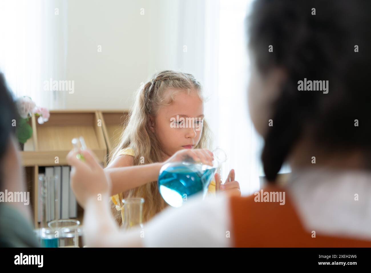 Teacher and students, Learn and experiment with science in a school ...