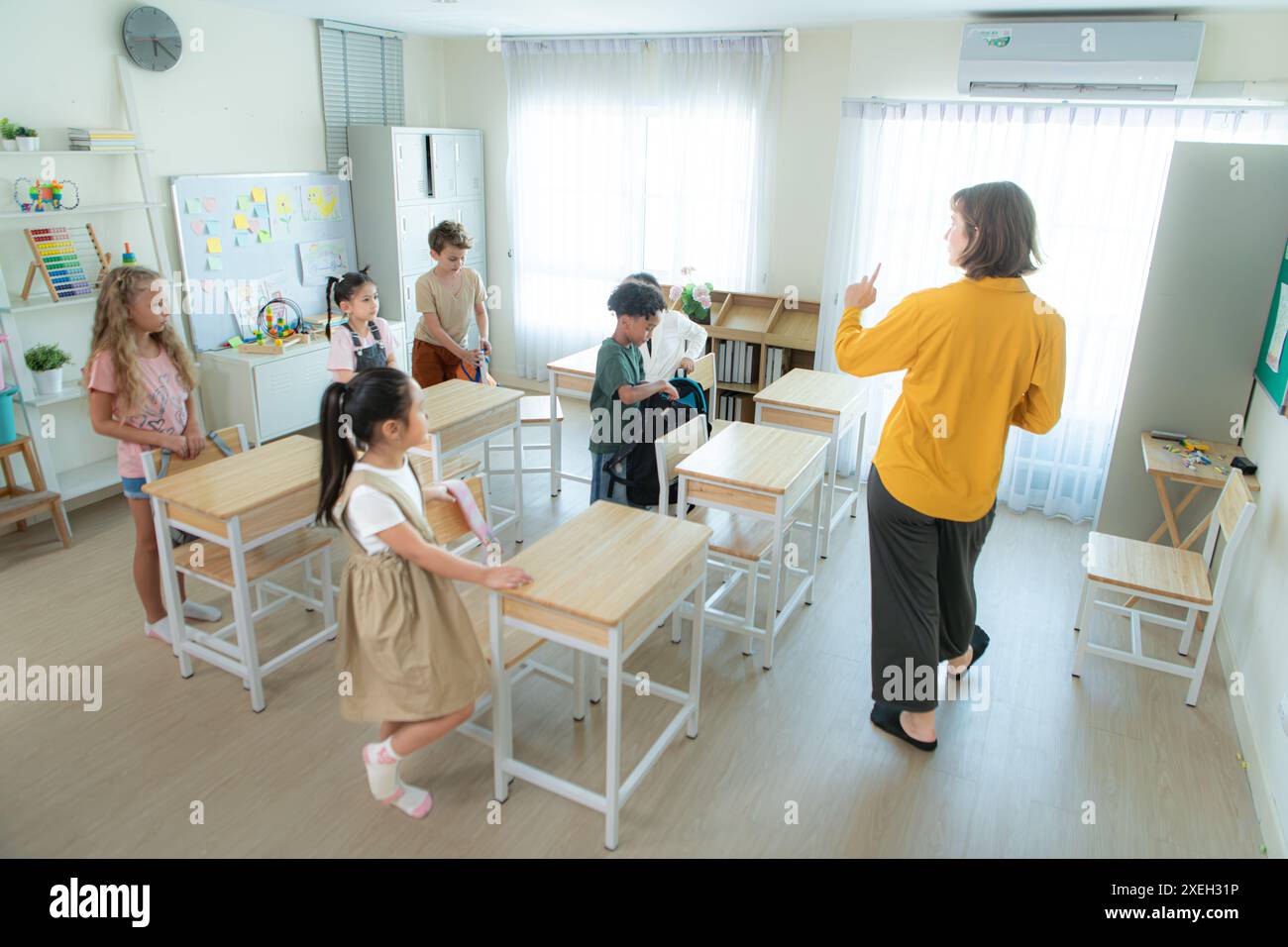 Teacher and students, In the morning to begin learning and studying in ...