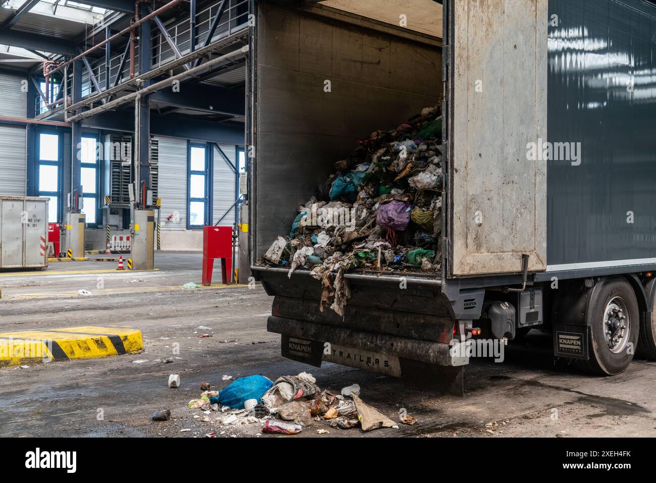 Garbage is delivered and dumped into the garbage bunker Stock Photo - Alamy