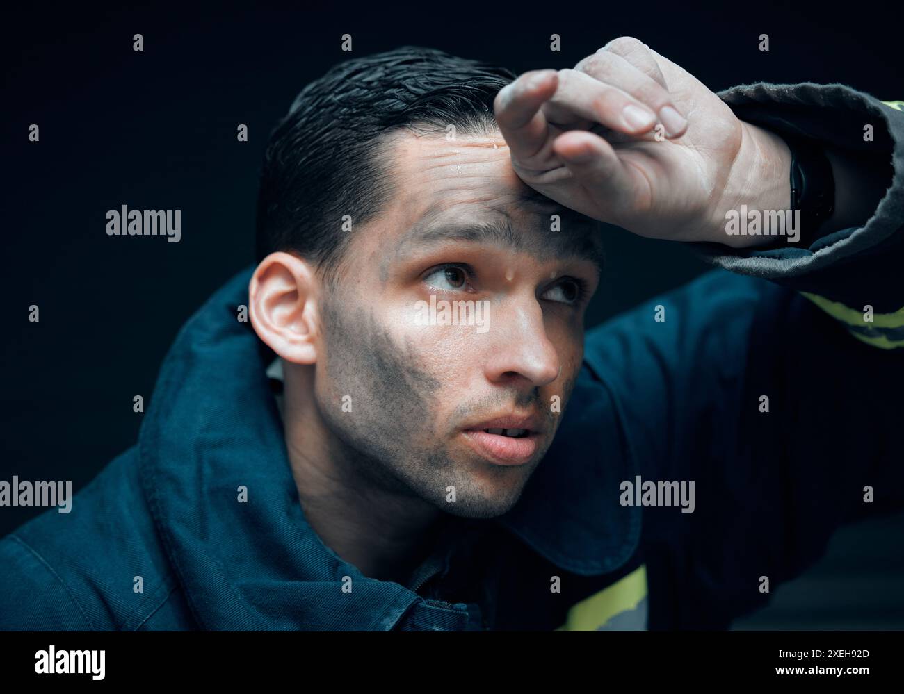 Working, firefighter or man with job in studio, thinking and planning ...