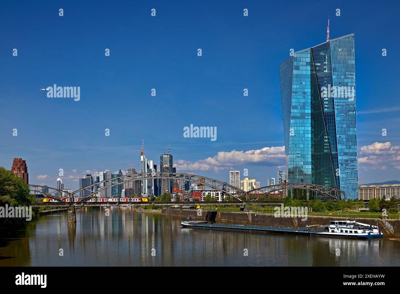 ECB European Central Bank with cargo ship and the skyline of Frankfurt ...
