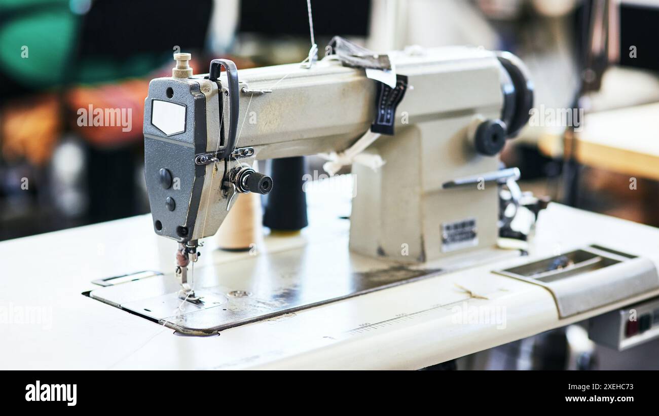 Sewing machine, needle and cotton thread for fashion in workshop for ...