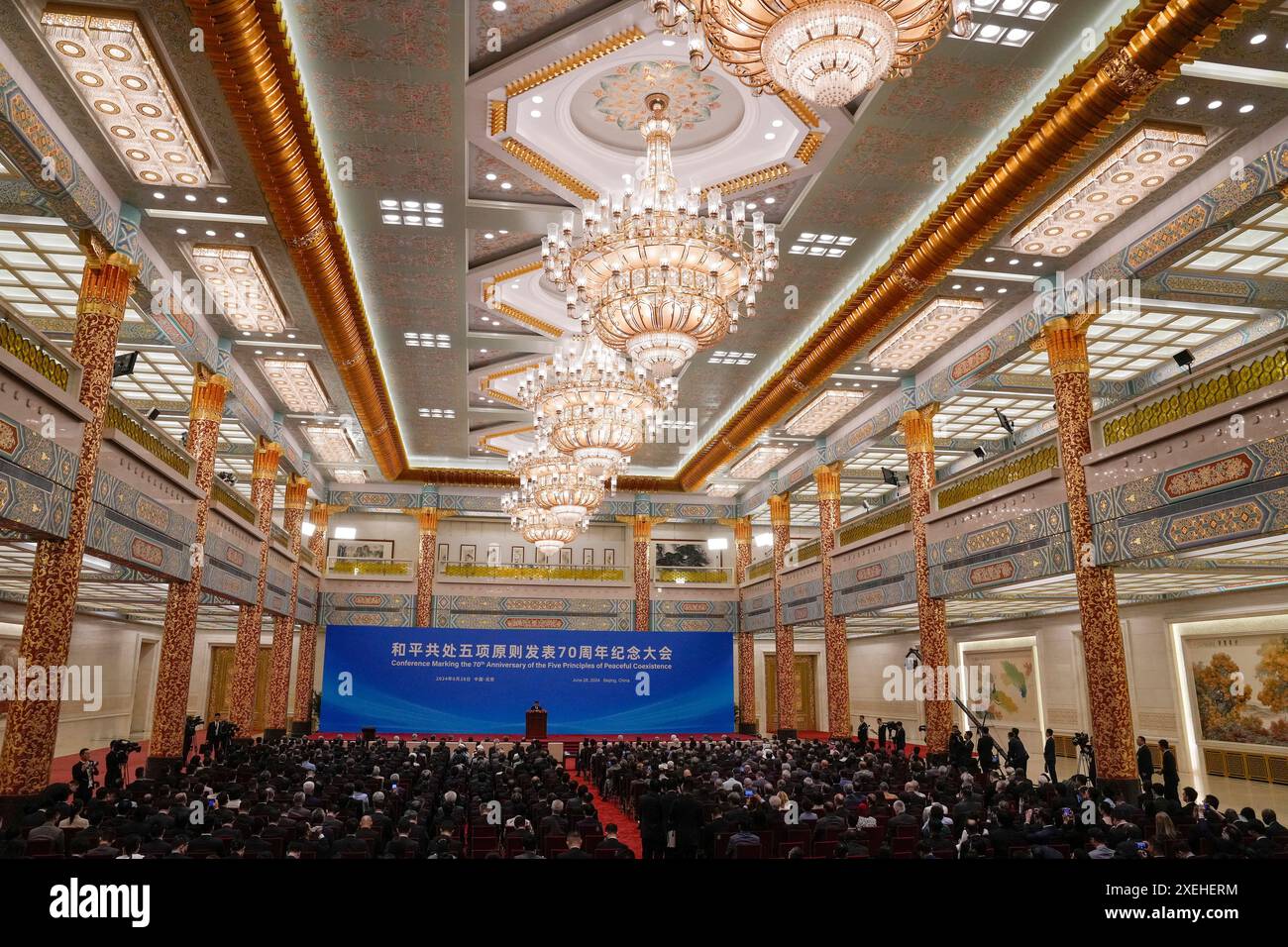 Chinese President Xi Jinping delivers his speech on stage for a ...