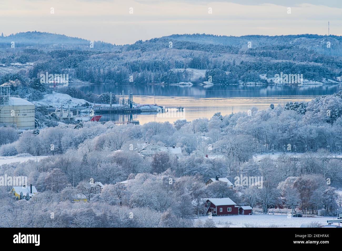Ice cold landscape with small farm and industrial buildings Stock Photo ...