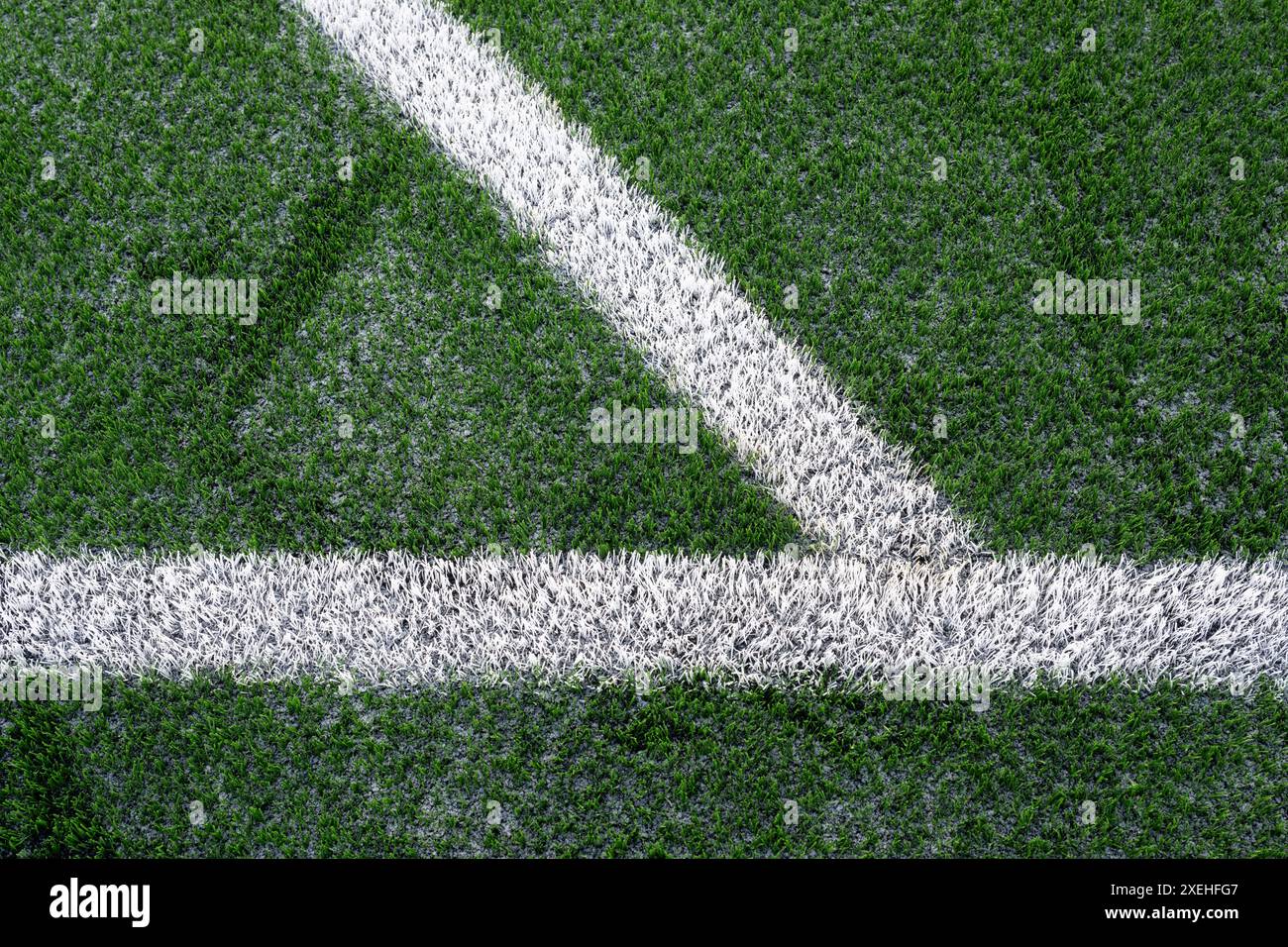 White markings of an artificial turf football field Stock Photo - Alamy