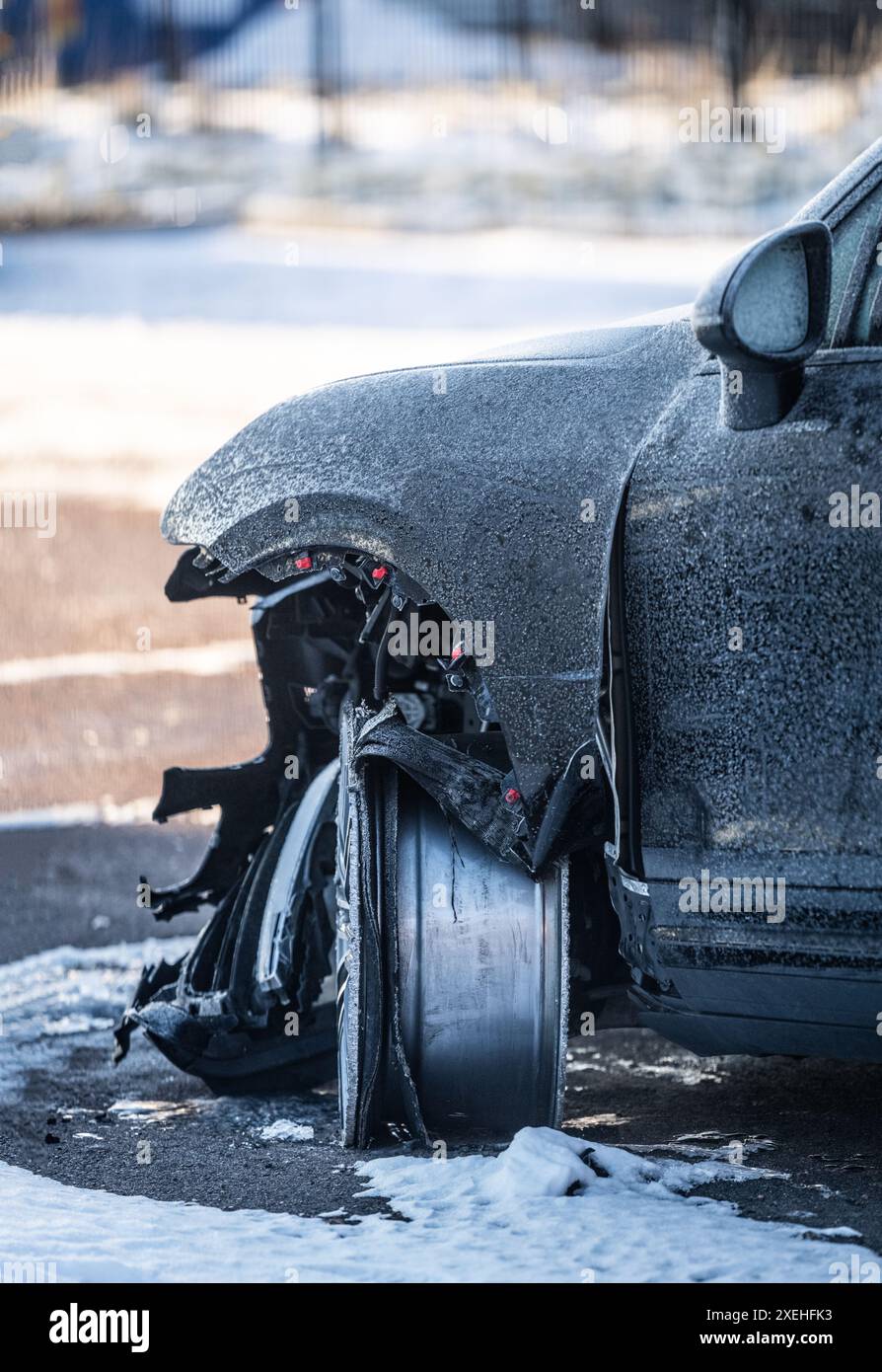Damaged front wheel of a crashed sports suv car Stock Photo - Alamy