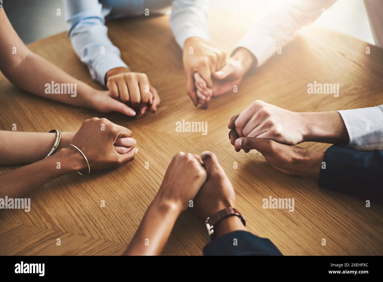 Praying church holding hands hi-res stock photography and images - Alamy
