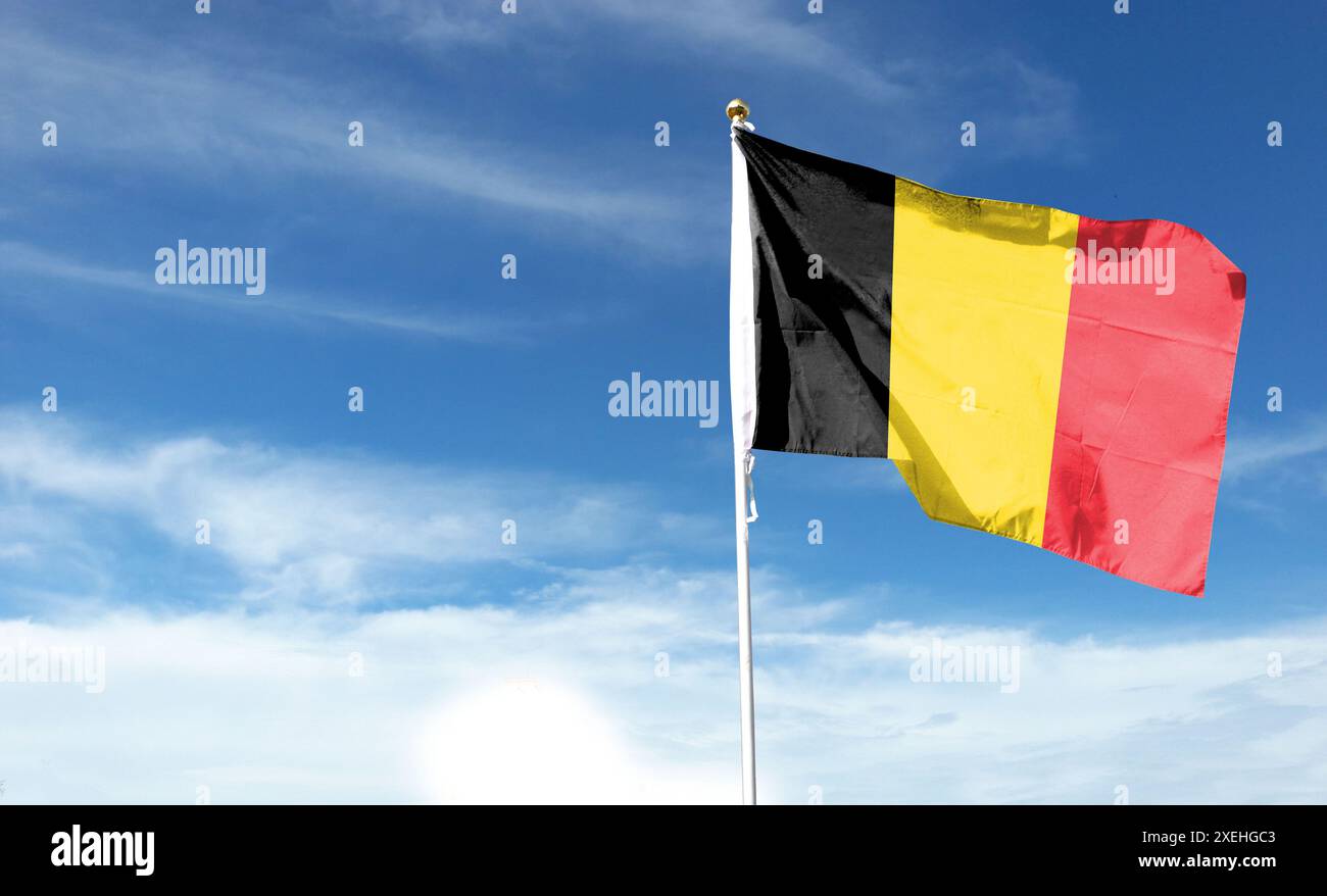 Belgium flag waving on flagpole hi-res stock photography and images - Alamy
