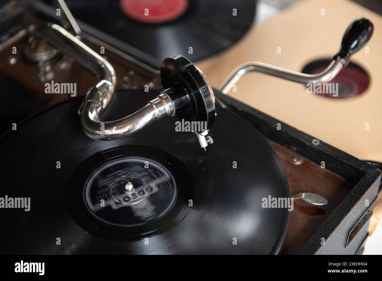 Old vintage turntable vinyl record player with disc spinning and ...