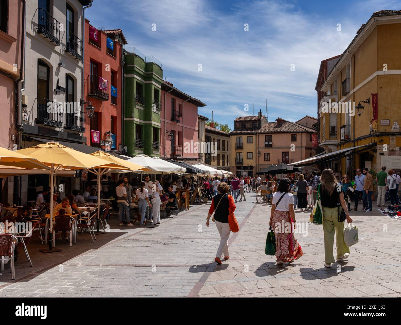 People enjoying a beautiful spring day in the colourful historic city ...
