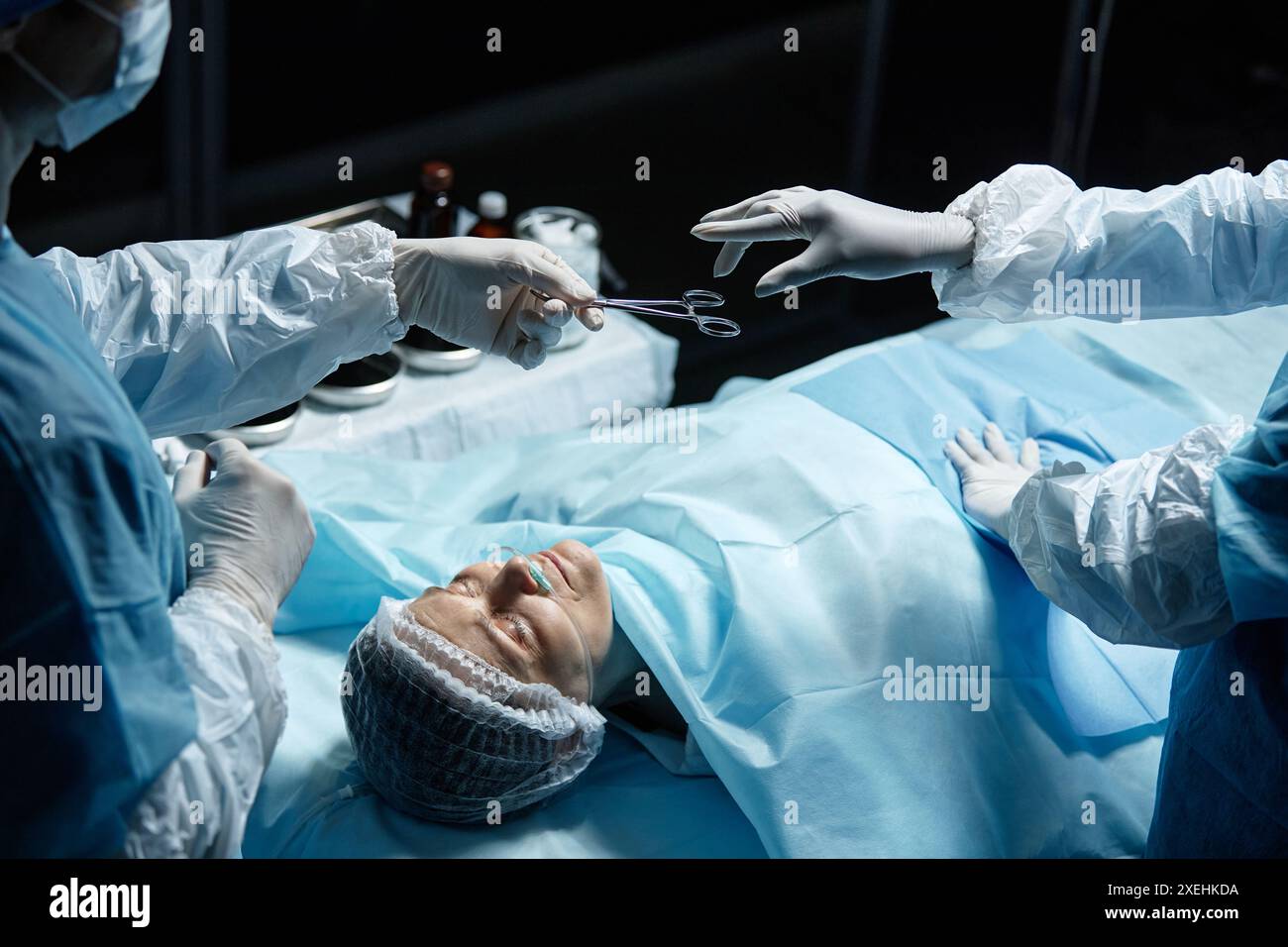 Woman lying on operating table hi-res stock photography and images - Alamy