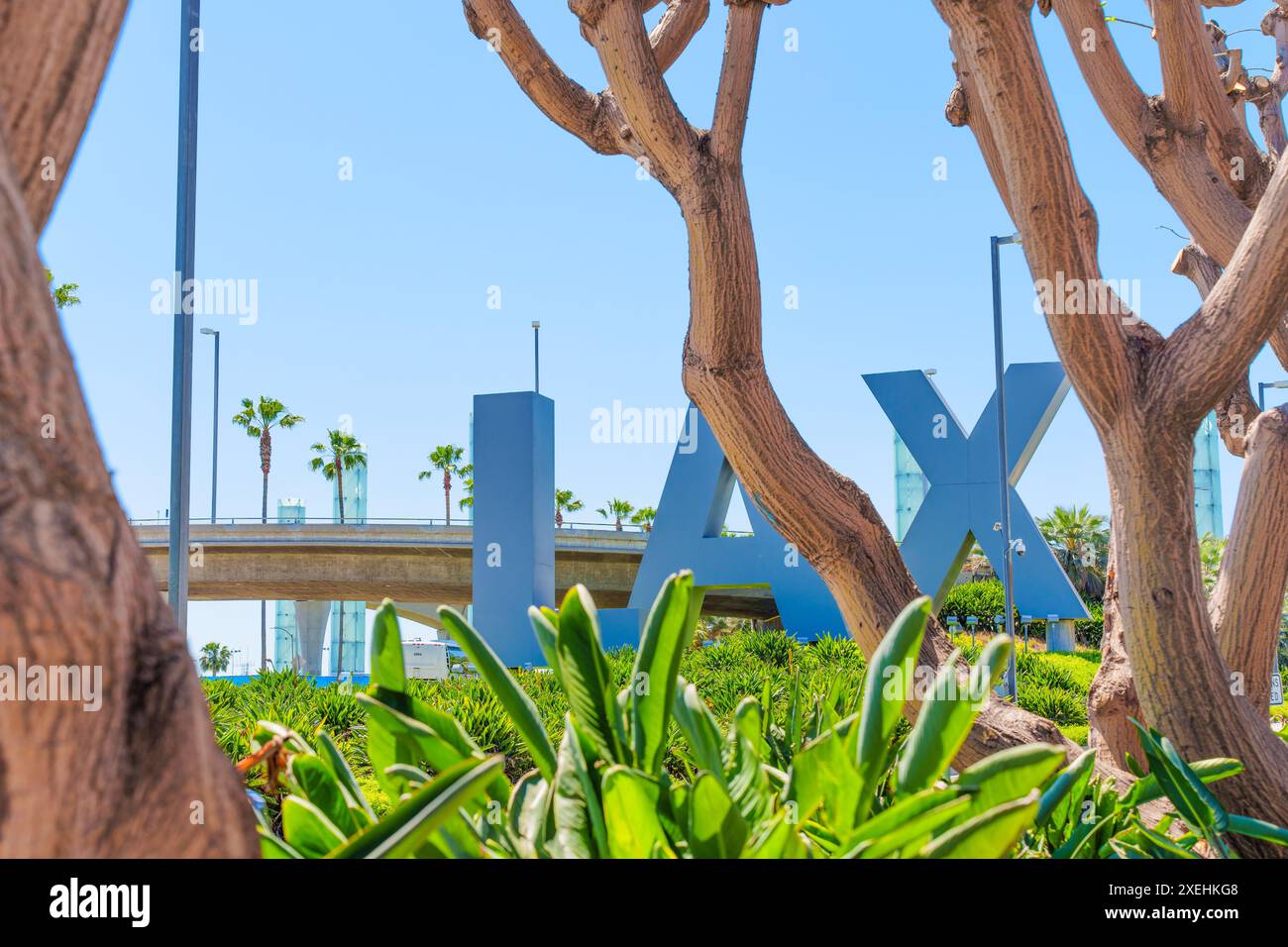 Los Angeles, California - April 8, 2024: LAX sign framed by intertwined ...