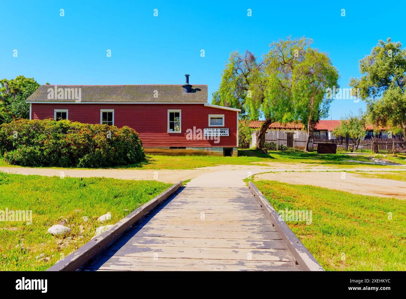 San Diego, California - April 16, 2024: Wooden walkway leading to the Mason Street School Museum ...
