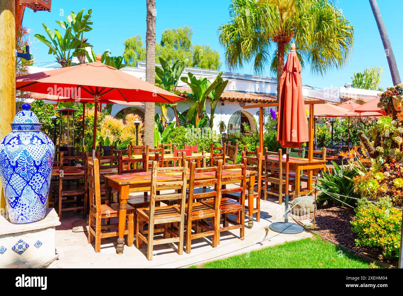 San Diego, California - April 16, 2024: Wooden tables and chairs set up ...
