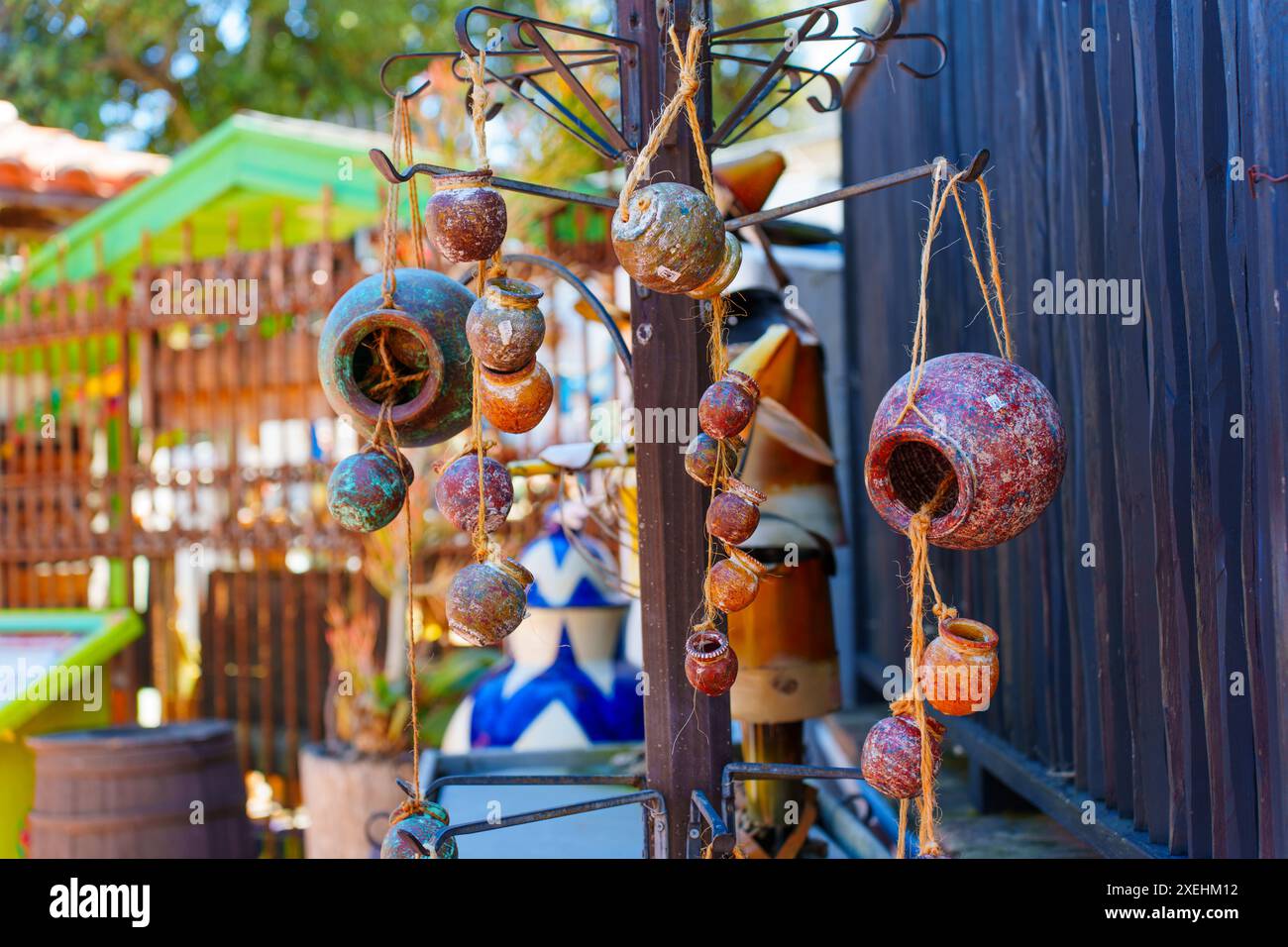 San Diego, California - April 16, 2024: Artisan clay pots of different ...