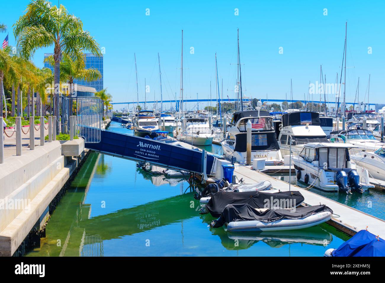 San Diego, California - April 16, 2024: Boats docked at marina near ...