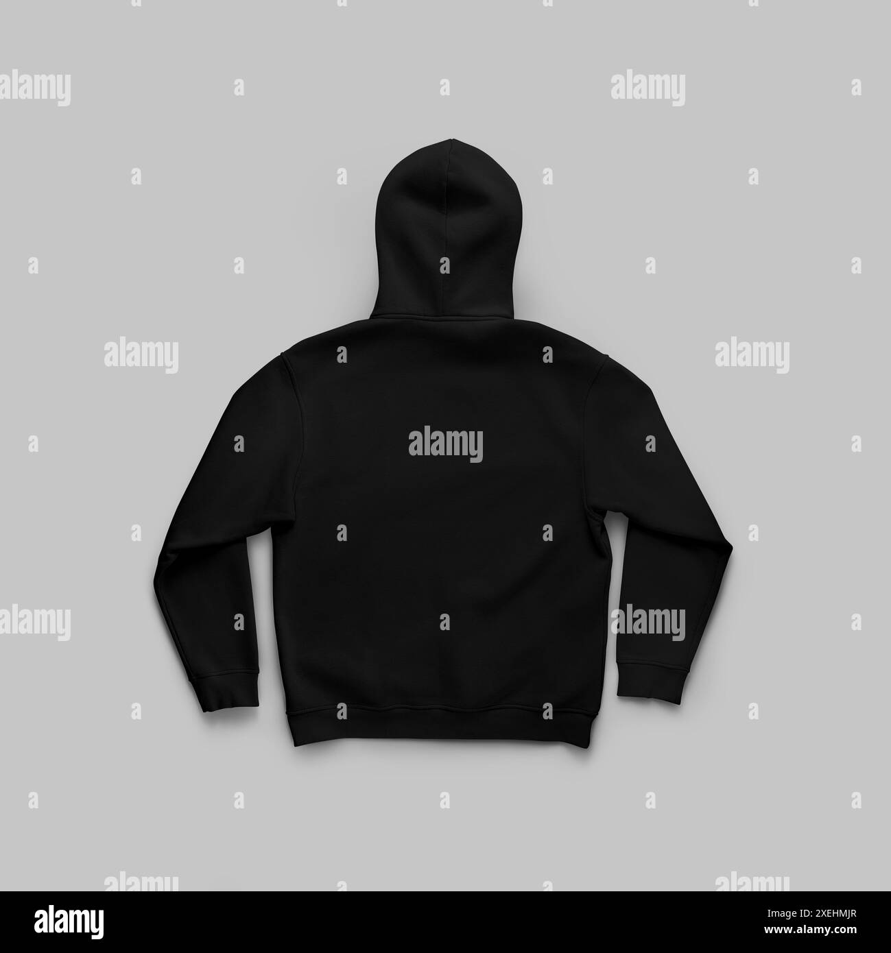 Mockup of an oversized black hoodie, back view, unfolded on a white ...
