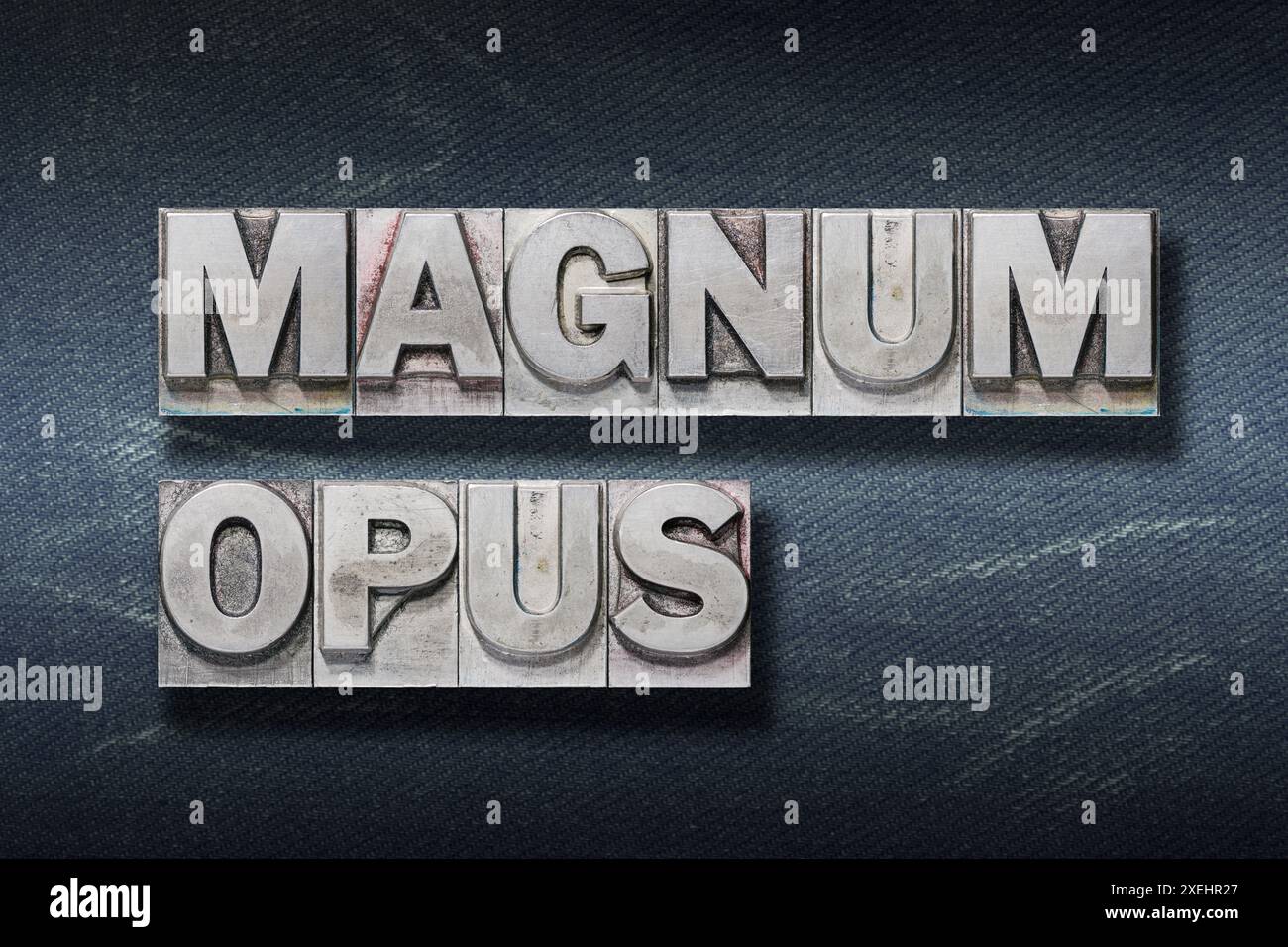 magnum opus (great work) Latin phrase made from metallic letterpress on ...