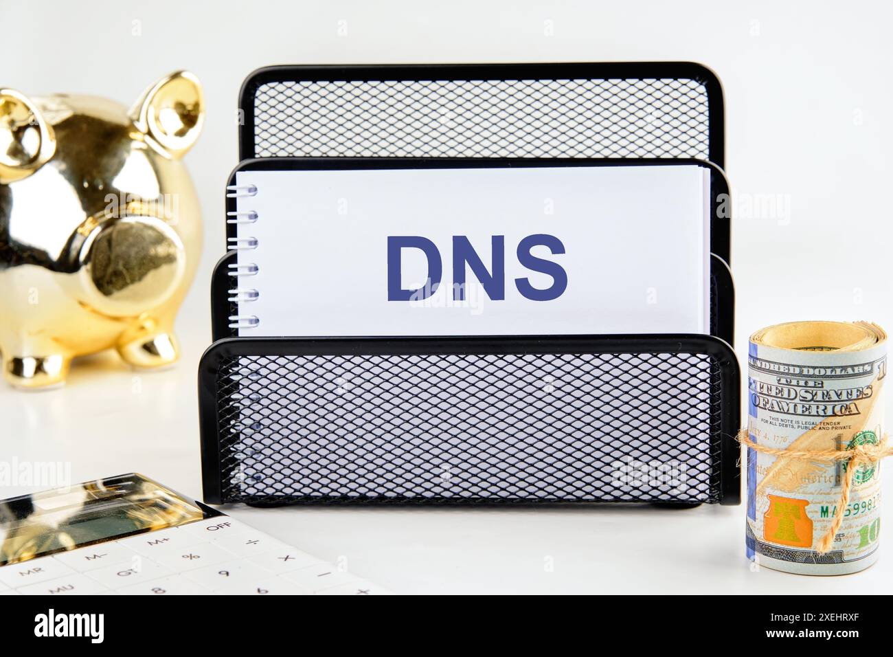 DNS (Domain Name System) acronym. DNS in a notebook on a stand Stock ...