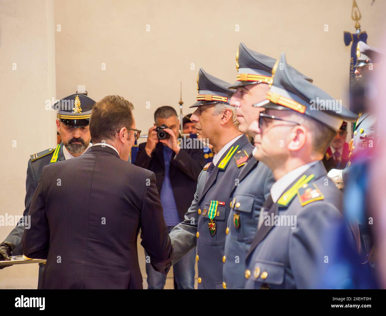 Standing uniform shaking hands celebration hi-res stock photography and ...