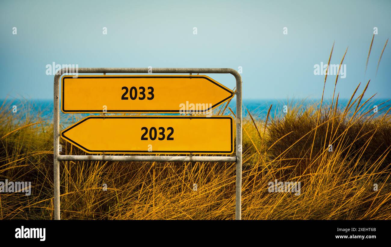 Signposts the direct way to 2033 versus 2032 Stock Photo - Alamy
