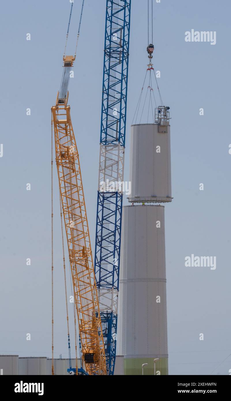 wind turbine - a large crane works on the construction of a wind ...