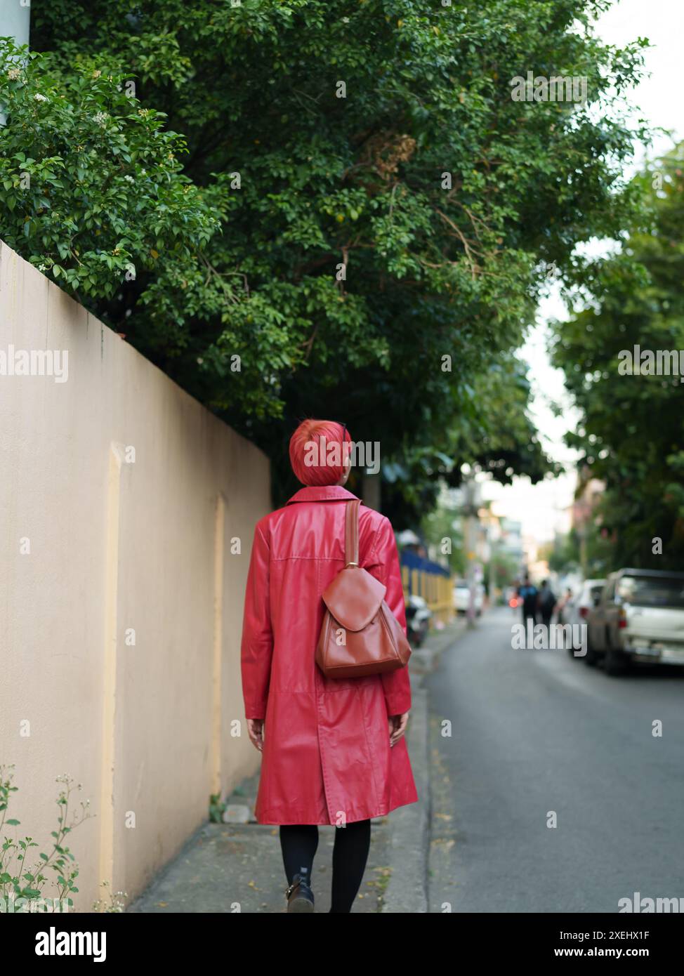 Gen z girl leather fashion with punk Asian woman tourist of local city ...