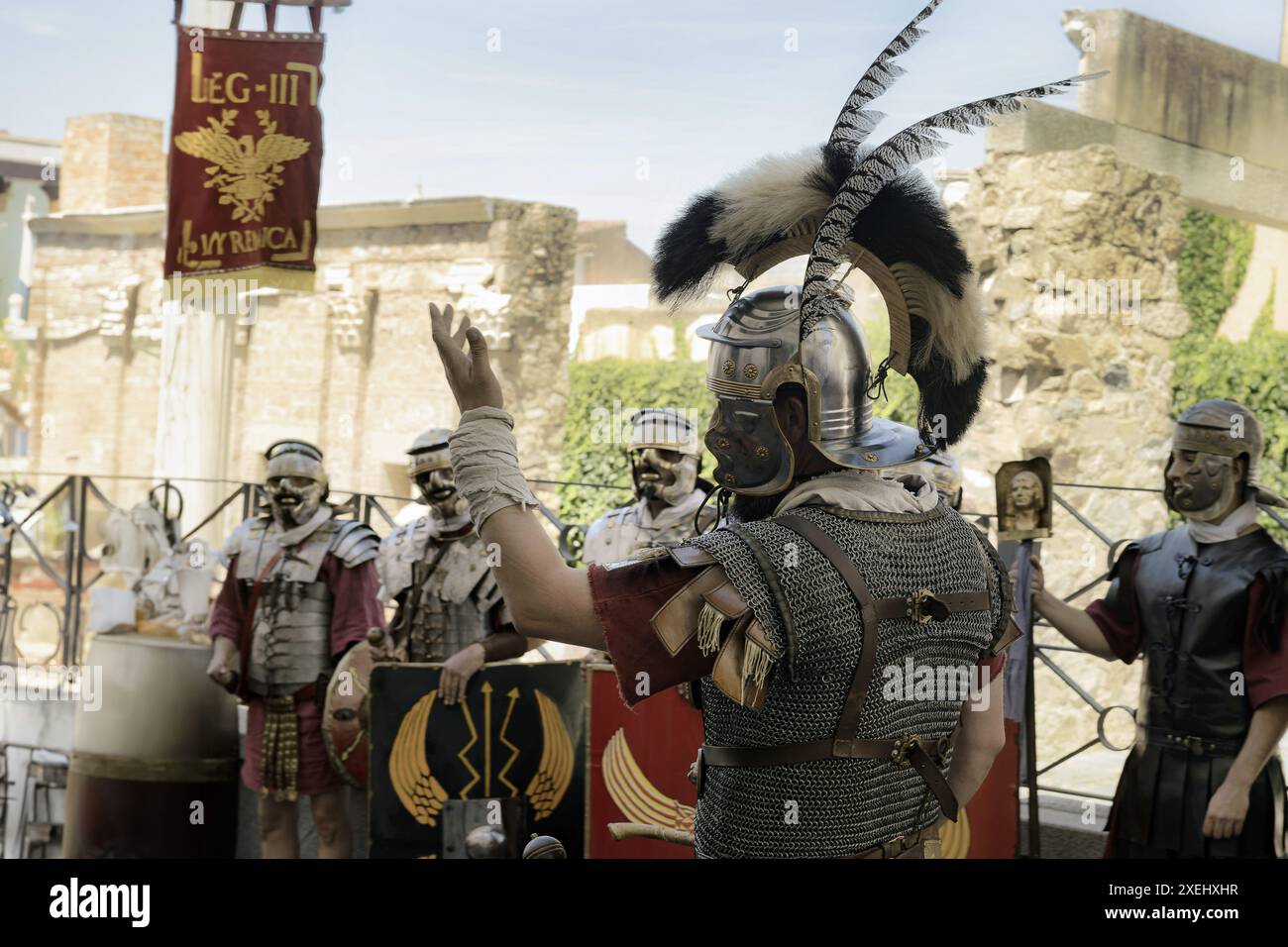 Enthusiastic reenactors dressed as Roman legionaries perform at the ...