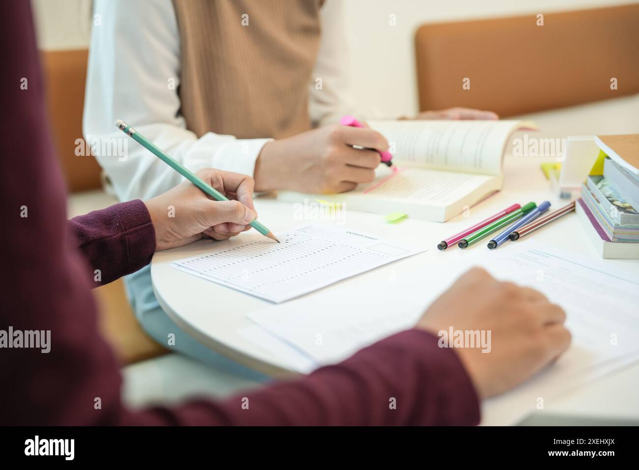 Learning with friends Young students campus High School Tutor for ...