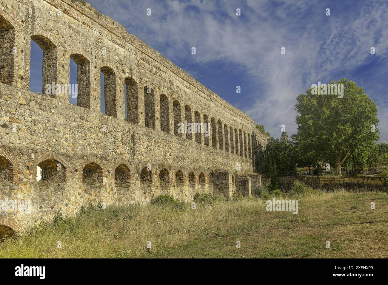 A section of the ancient Roman aqueduct in Merida, Spain, showcasing ...