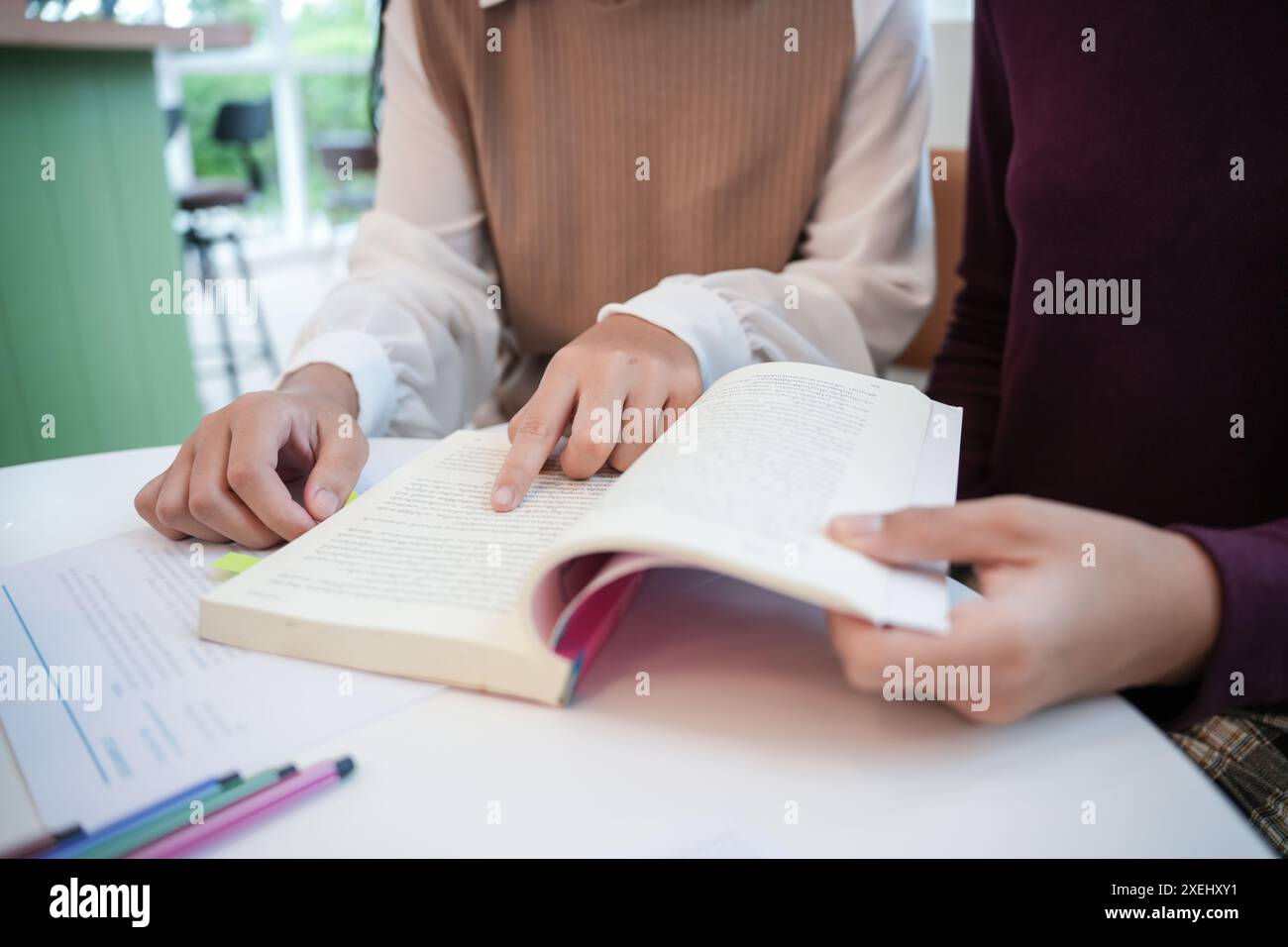 Learning with friends Young students campus High School Tutor for ...