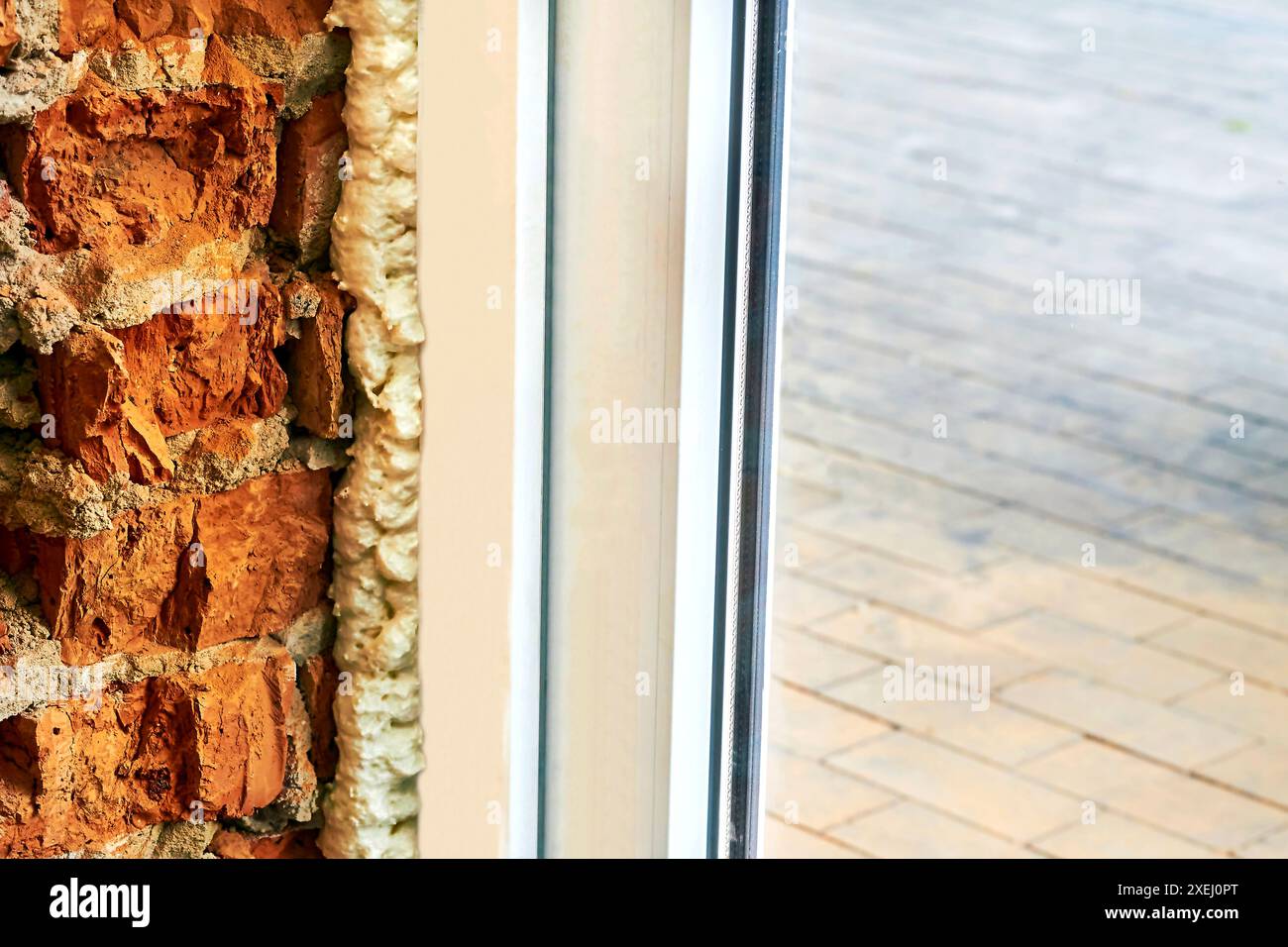 an opening in the wall or roof of a building that is fitted with glass ...