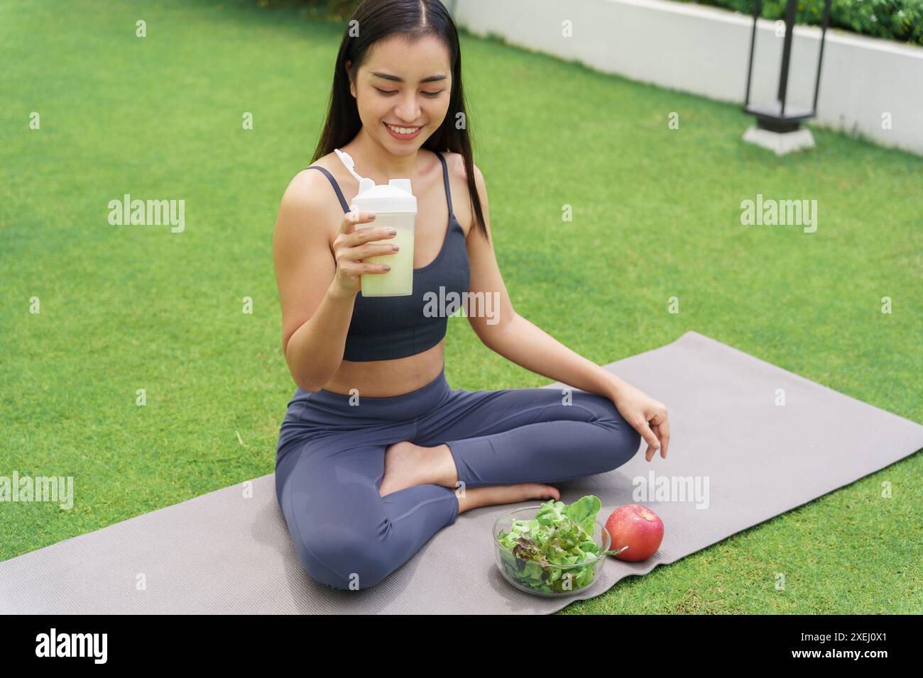 Woman drinking protein shake hi-res stock photography and images - Alamy