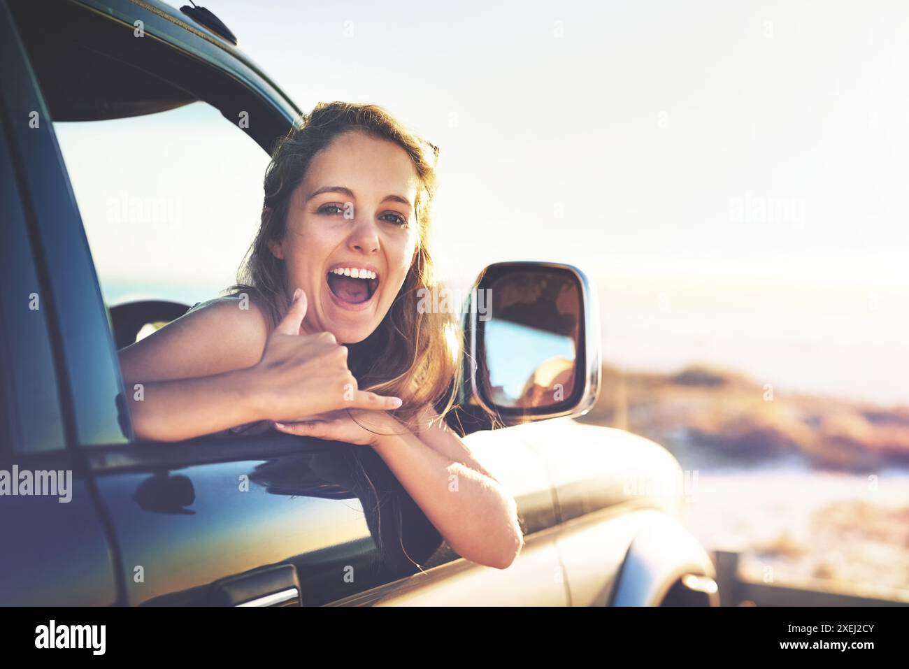 Woman, portrait and travel with smile on road trip, transport window ...