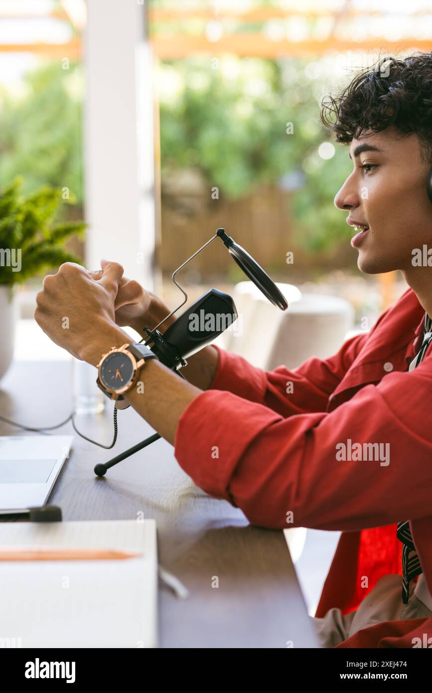 Man using microphone headphones recording hi-res stock photography and ...
