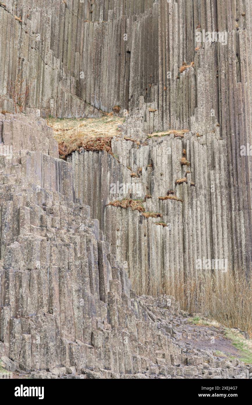 Tall and gray basalt columns. Basalt rock Panska Skala in Kamenice ...
