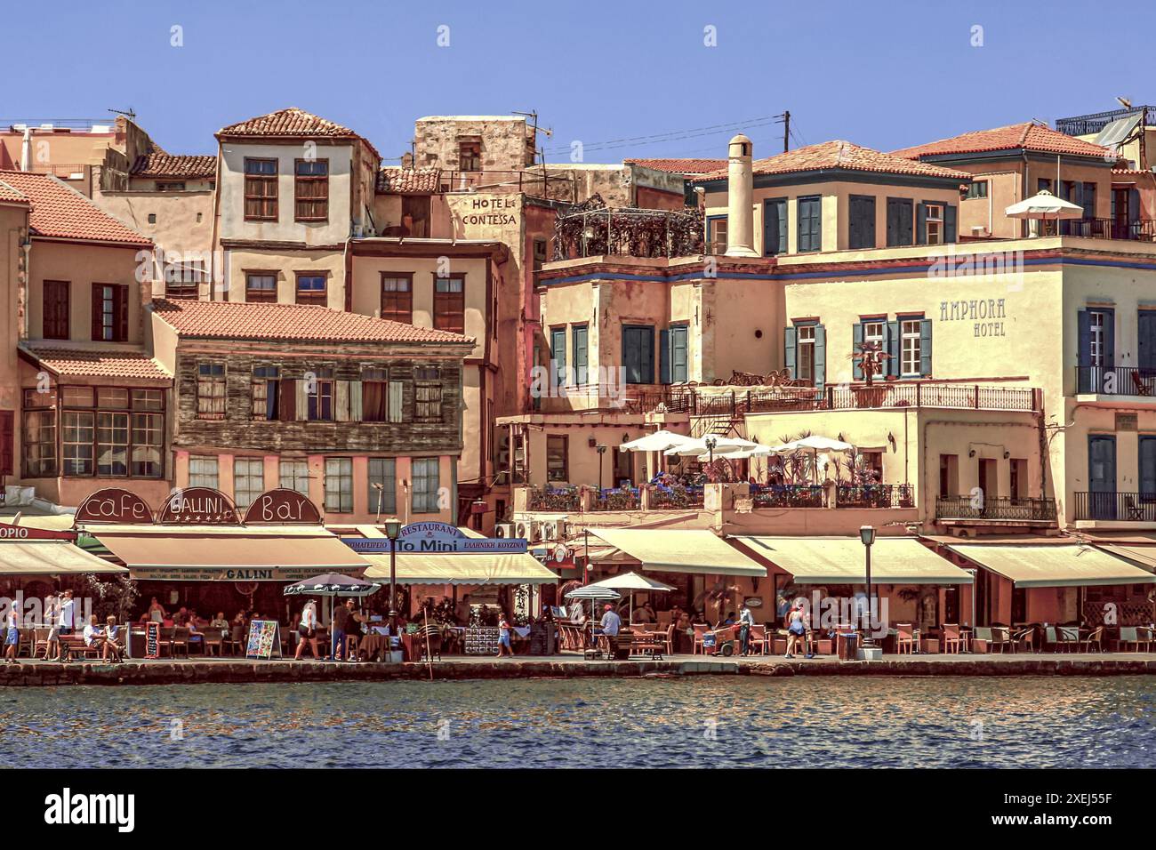Promenade of the port city of Chania in Crete Stock Photo - Alamy