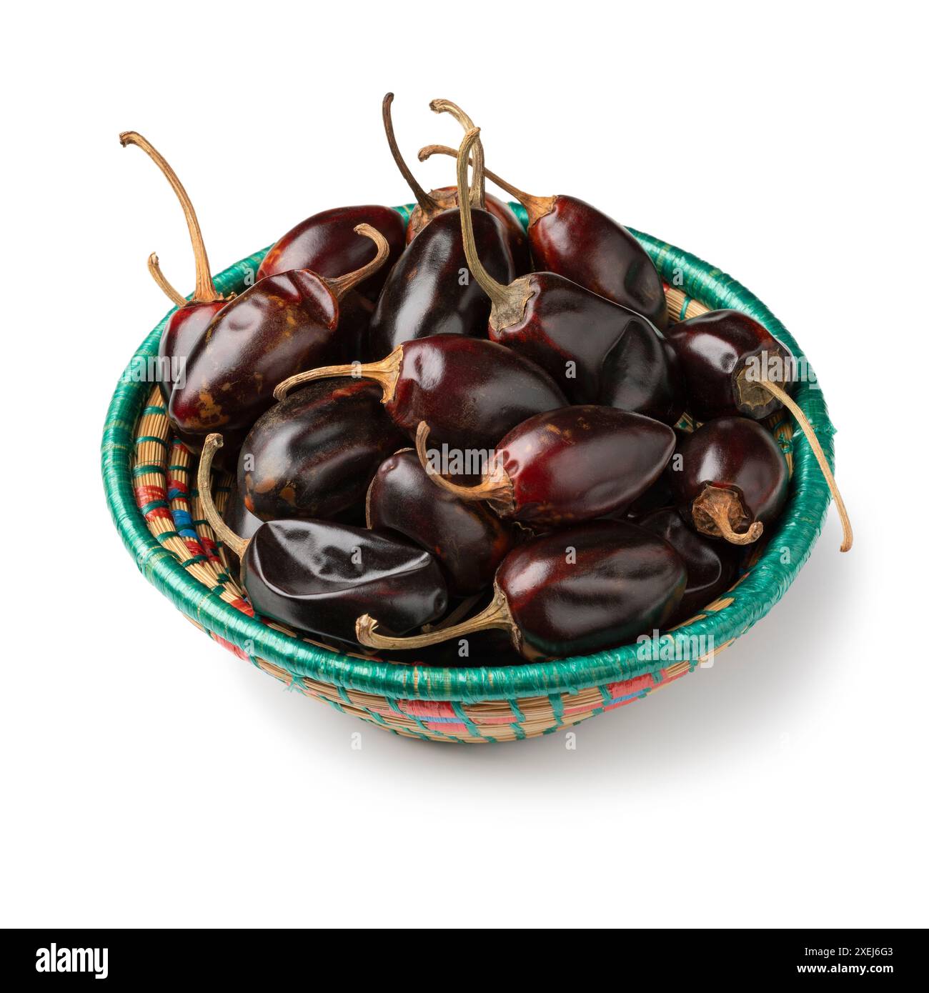 Basket with dried Mexican Chile Catarina, Catarina peppers isolated on ...