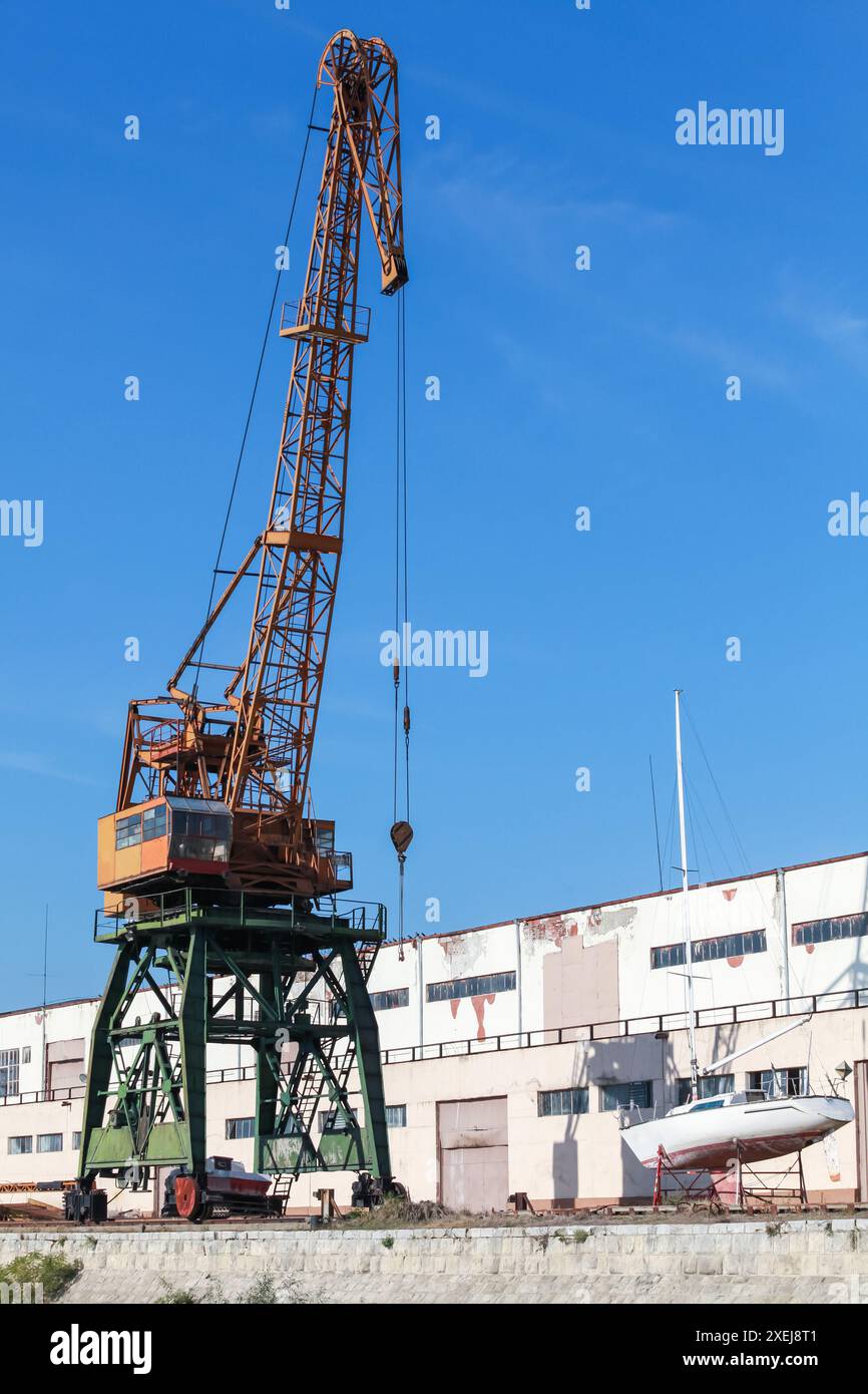 Portal crane is on the river coast in Bulgarian port Ruse Stock Photo ...