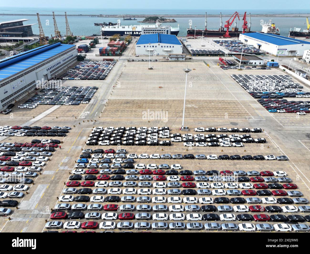 LIANYUNGANG, CHINA - JUNE 28, 2024 - Roll-on wheels are loaded with ...