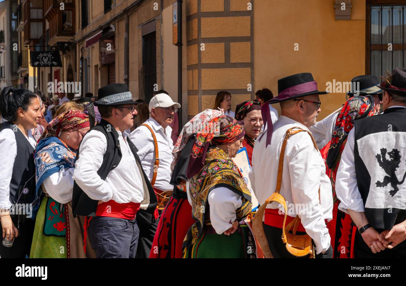 Spanish men and women dressed in traditional clothes of Castile and ...