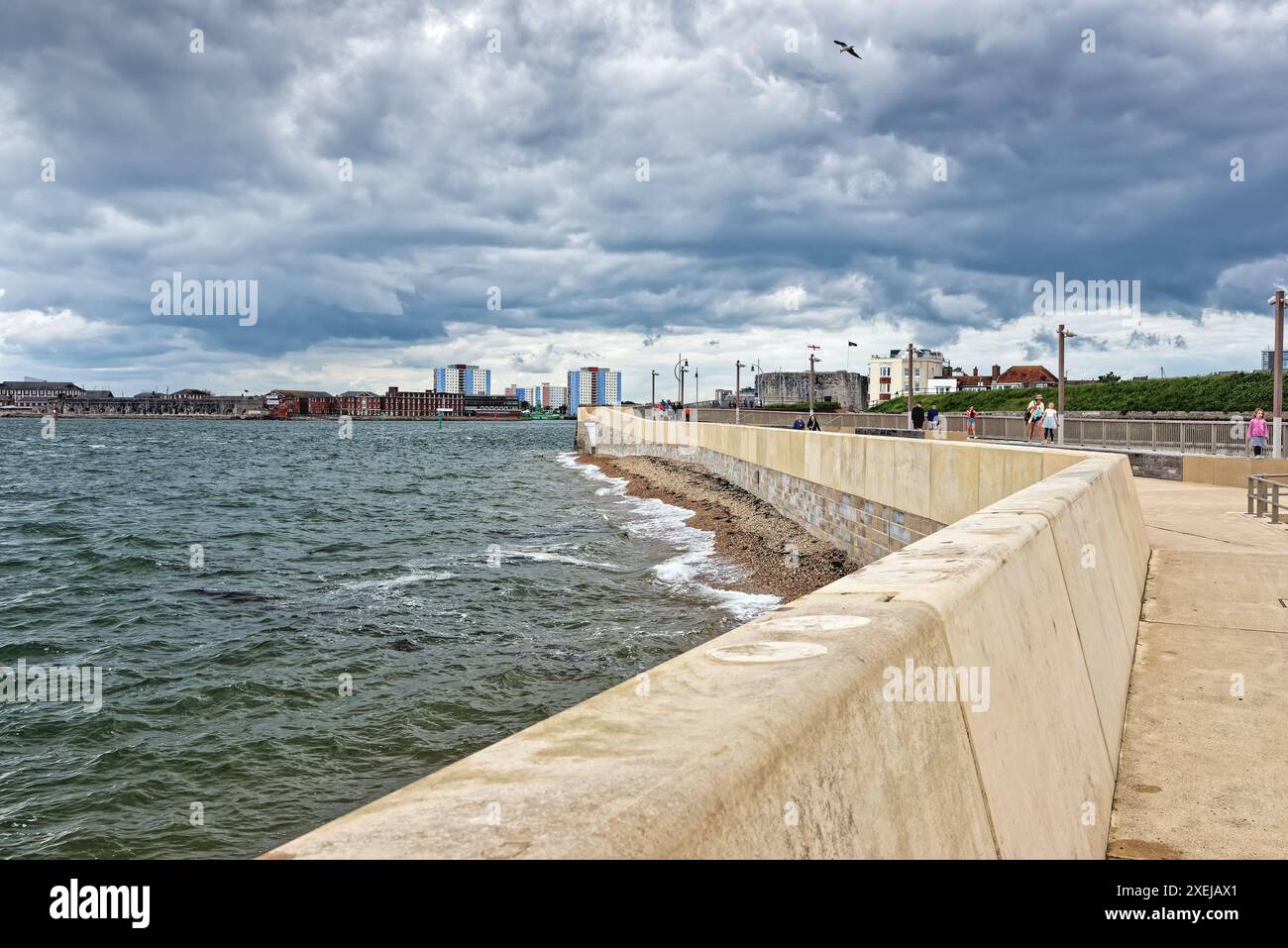Storm clouds forming over the recently built sea defence walls near the ...