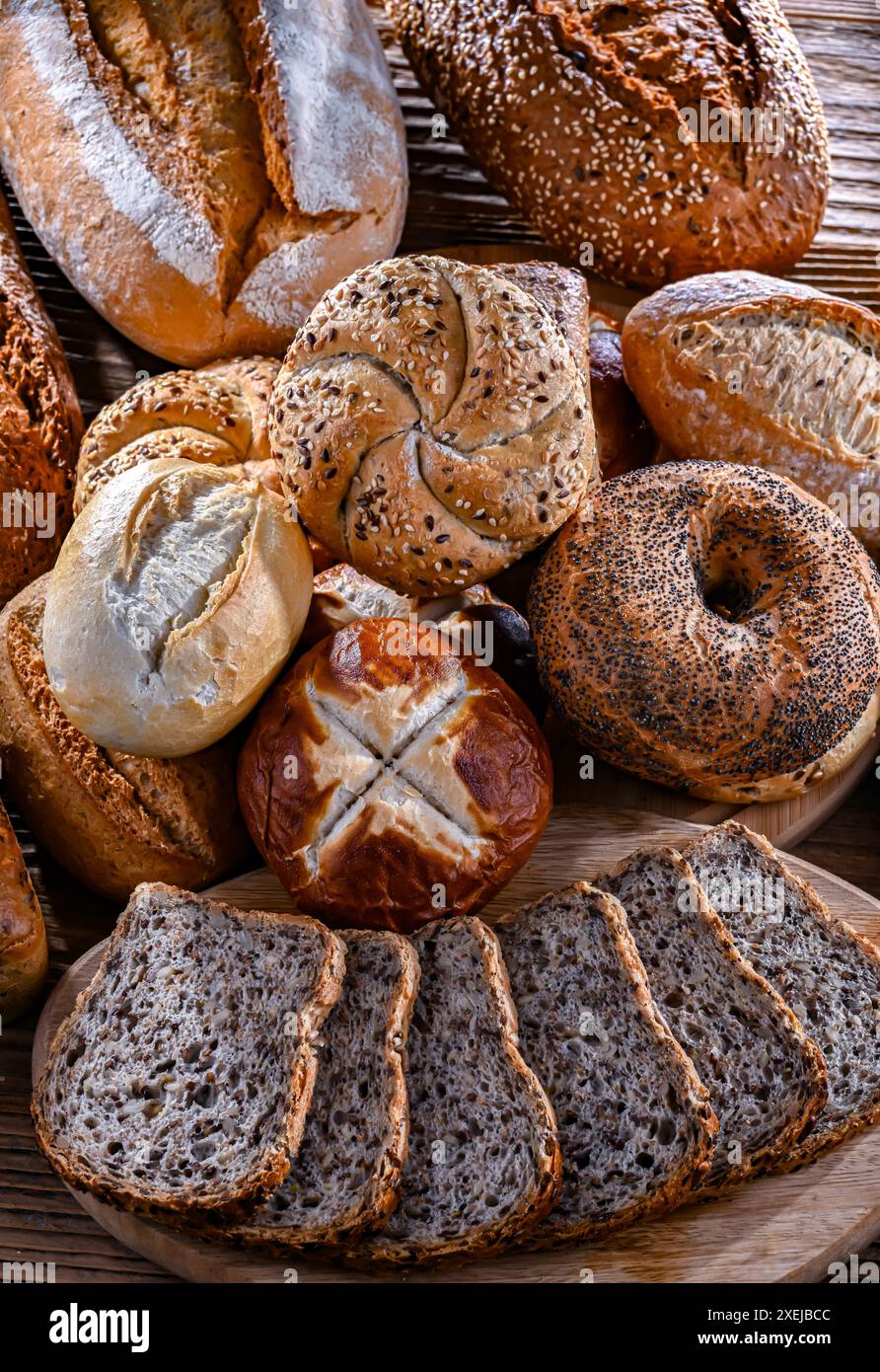 Assorted bakery products including loaves of bread and rolls Stock ...
