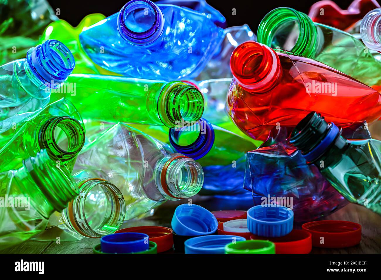 Empty colored drink bottles. Recyclable plastic waste Stock Photo - Alamy
