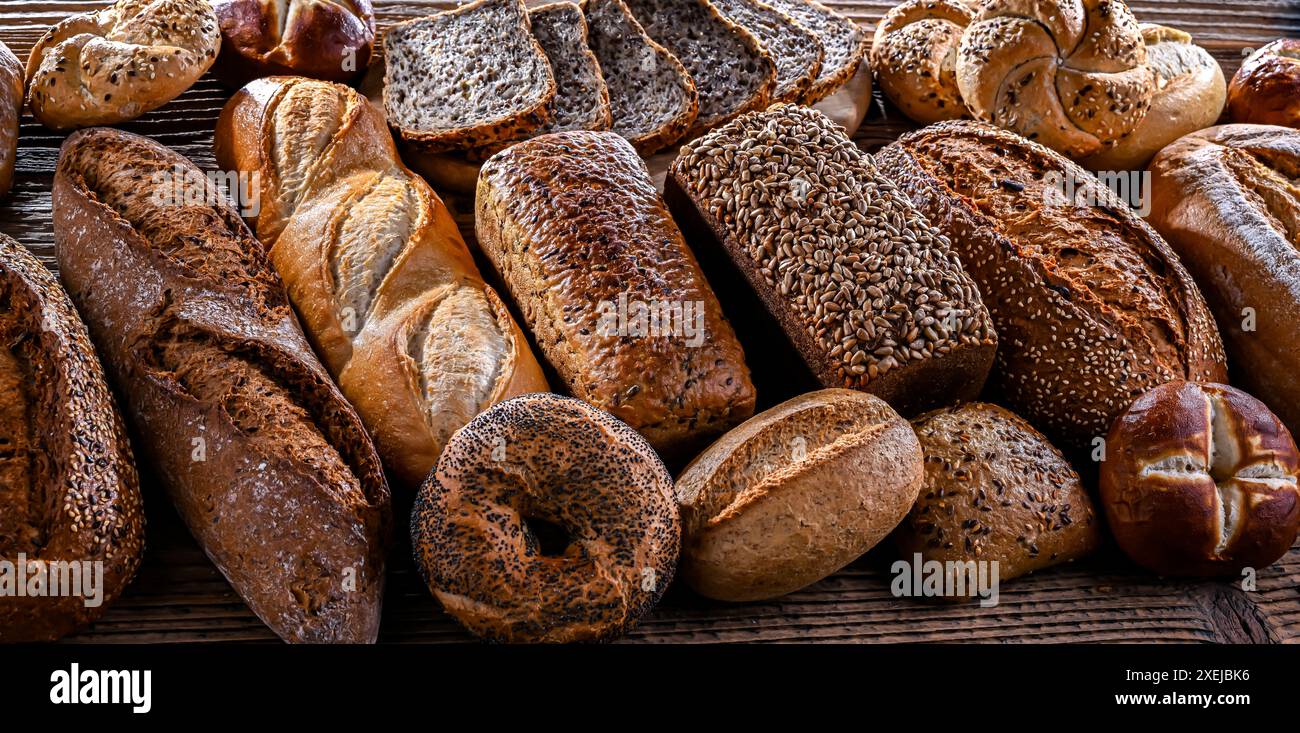 Assorted bakery products including loaves of bread and rolls Stock ...