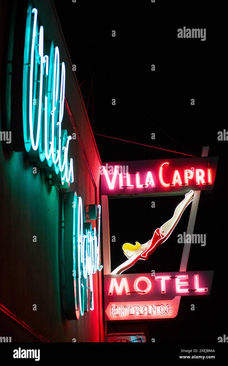 Neon signage for Villa Capri hotel in tourist town Stock Photo - Alamy