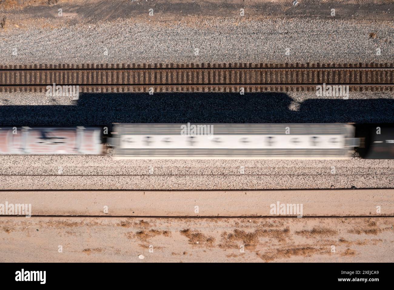 Overhead view looking straight down on moving train Stock Photo - Alamy