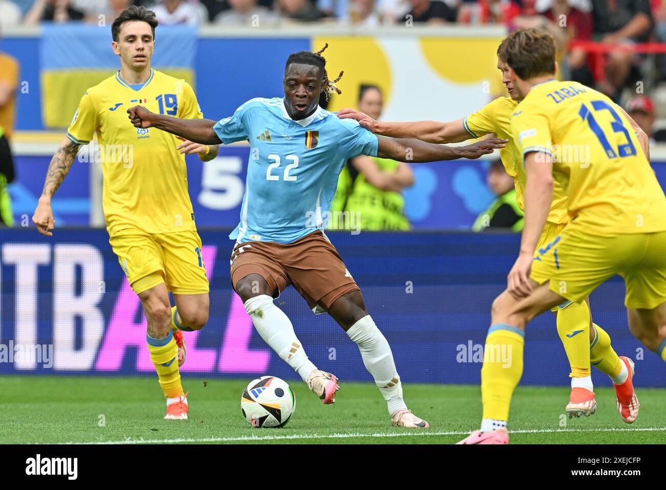 Jeremy Doku (22) of Belgium pictured in a duel with Mykola Shaparenko ...