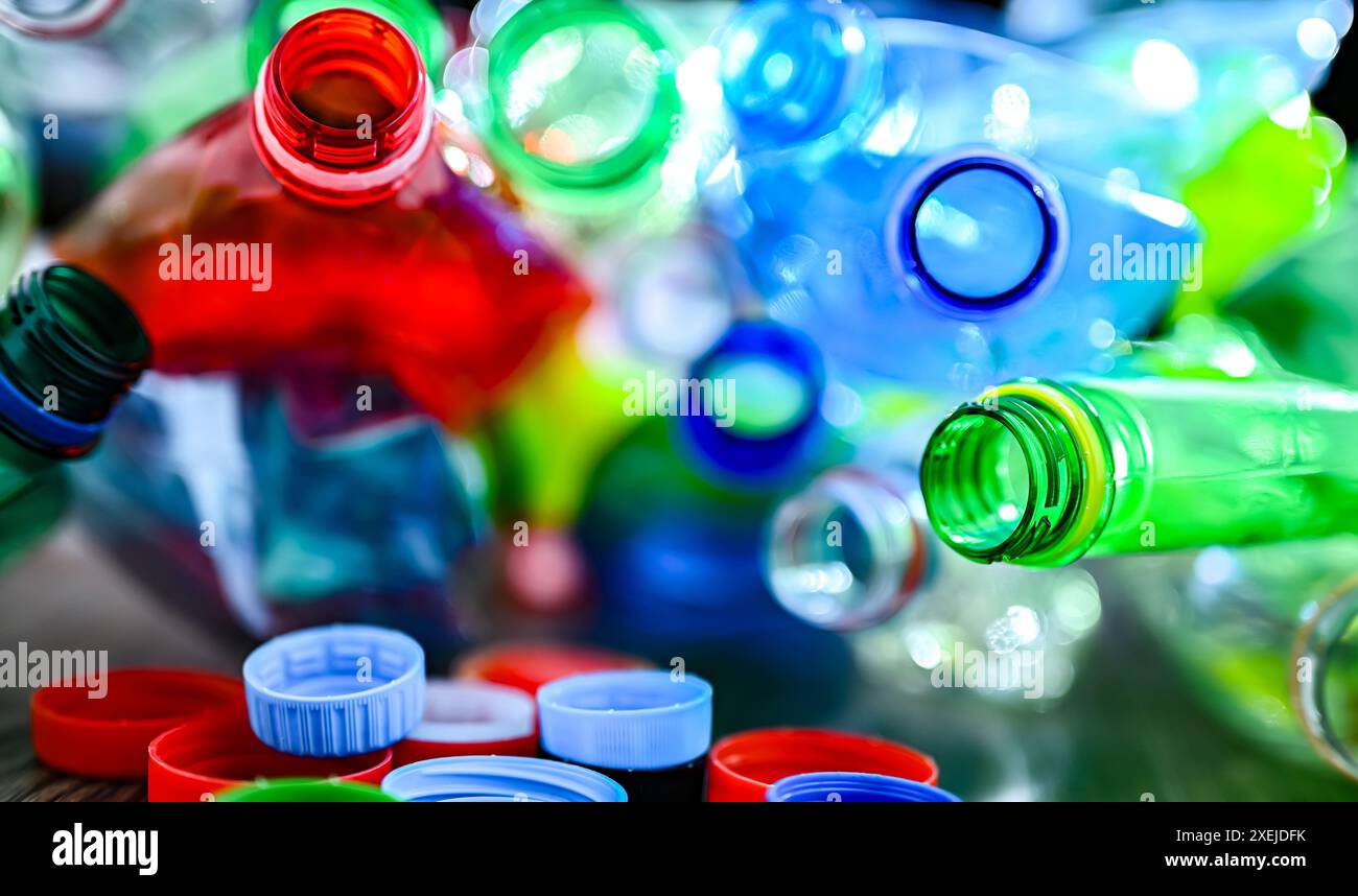 Empty colored drink bottles. Recyclable plastic waste Stock Photo - Alamy